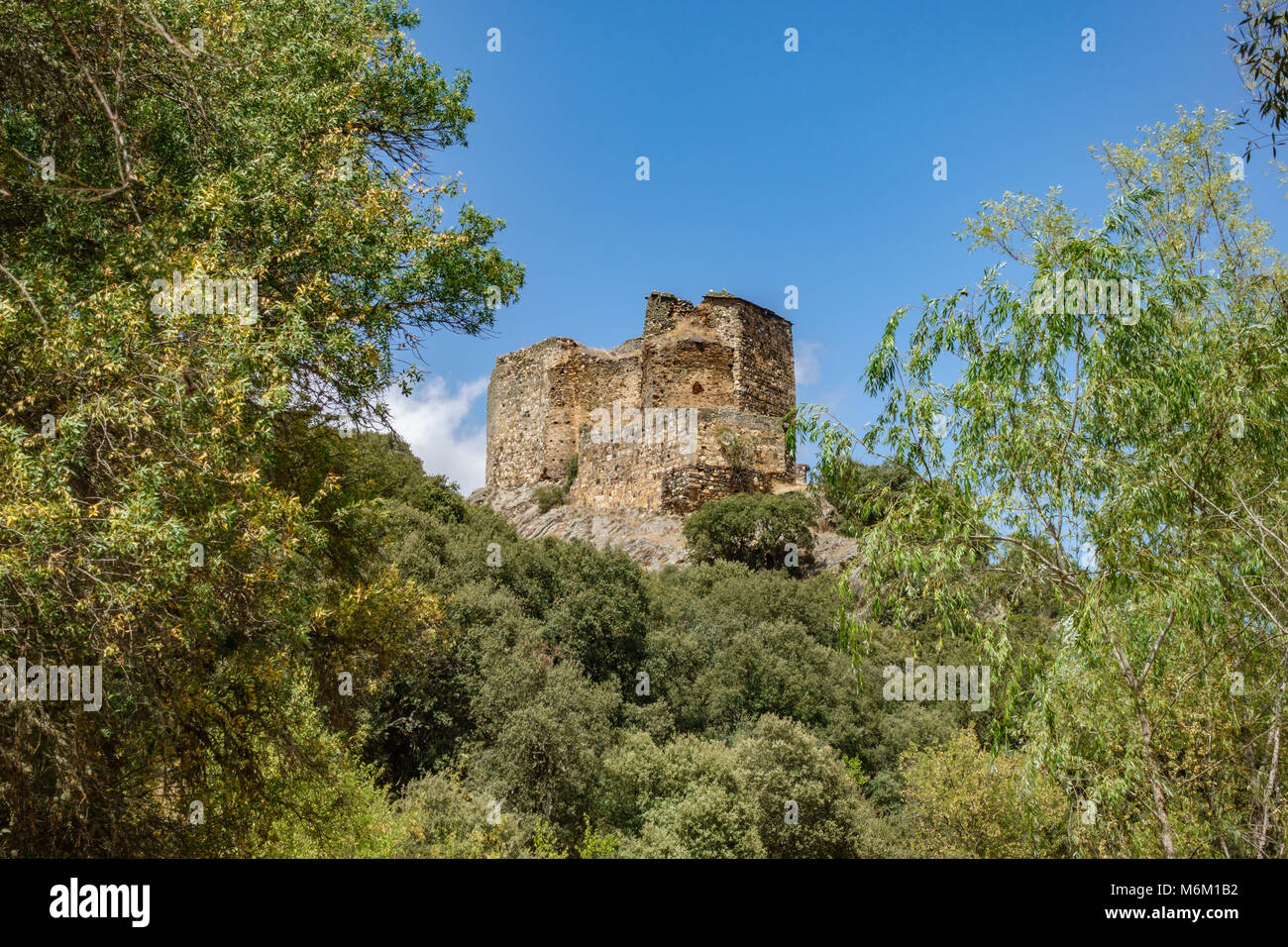 Ruined Alba castle over the hill against blue sky Stock Photo - Alamy