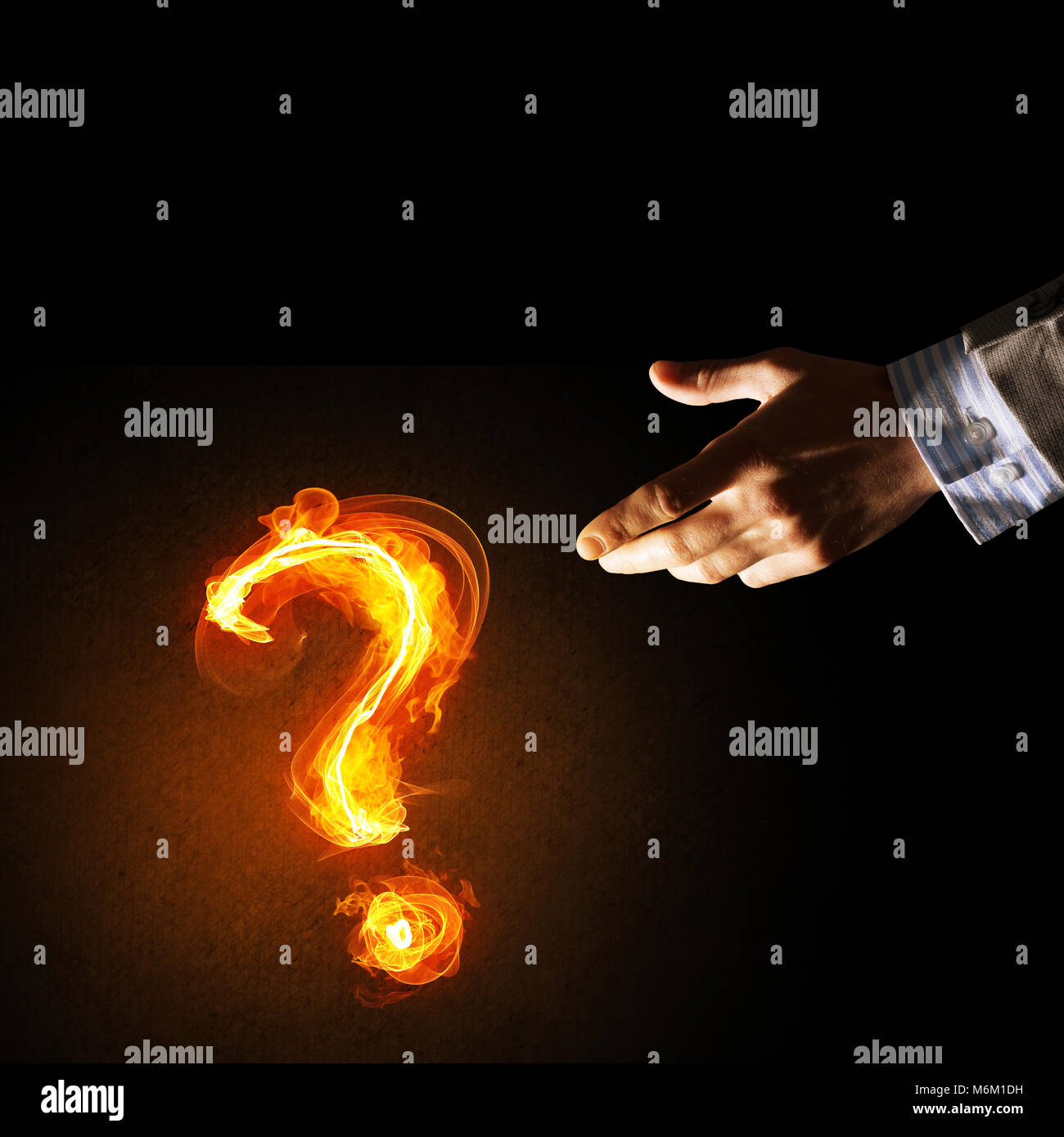 Concept of help or support with fire burning question mark Stock Photo ...