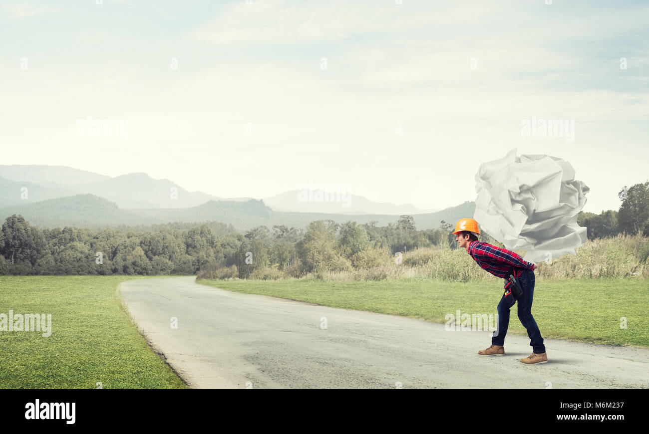 Engineer man carry load Stock Photo - Alamy