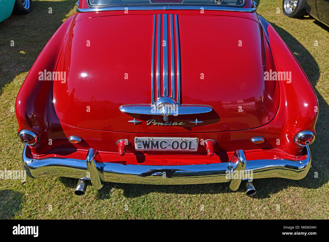 rear view of classic red pontiac Stock Photo - Alamy