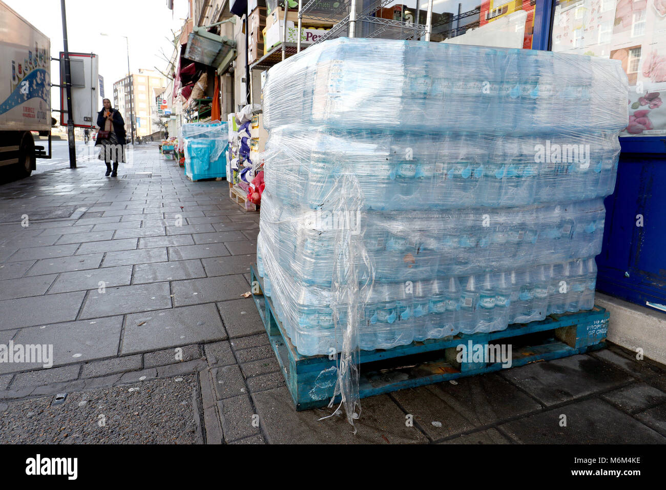 Stacks of bottled water outside a convenience store in Streatham Hill ...