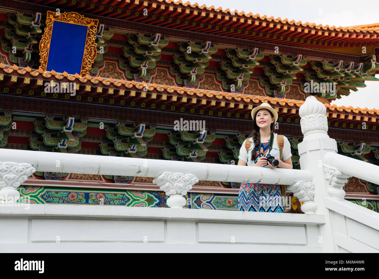 China summer travel woman in Asia. Chinese tourist relaxing looking at ...