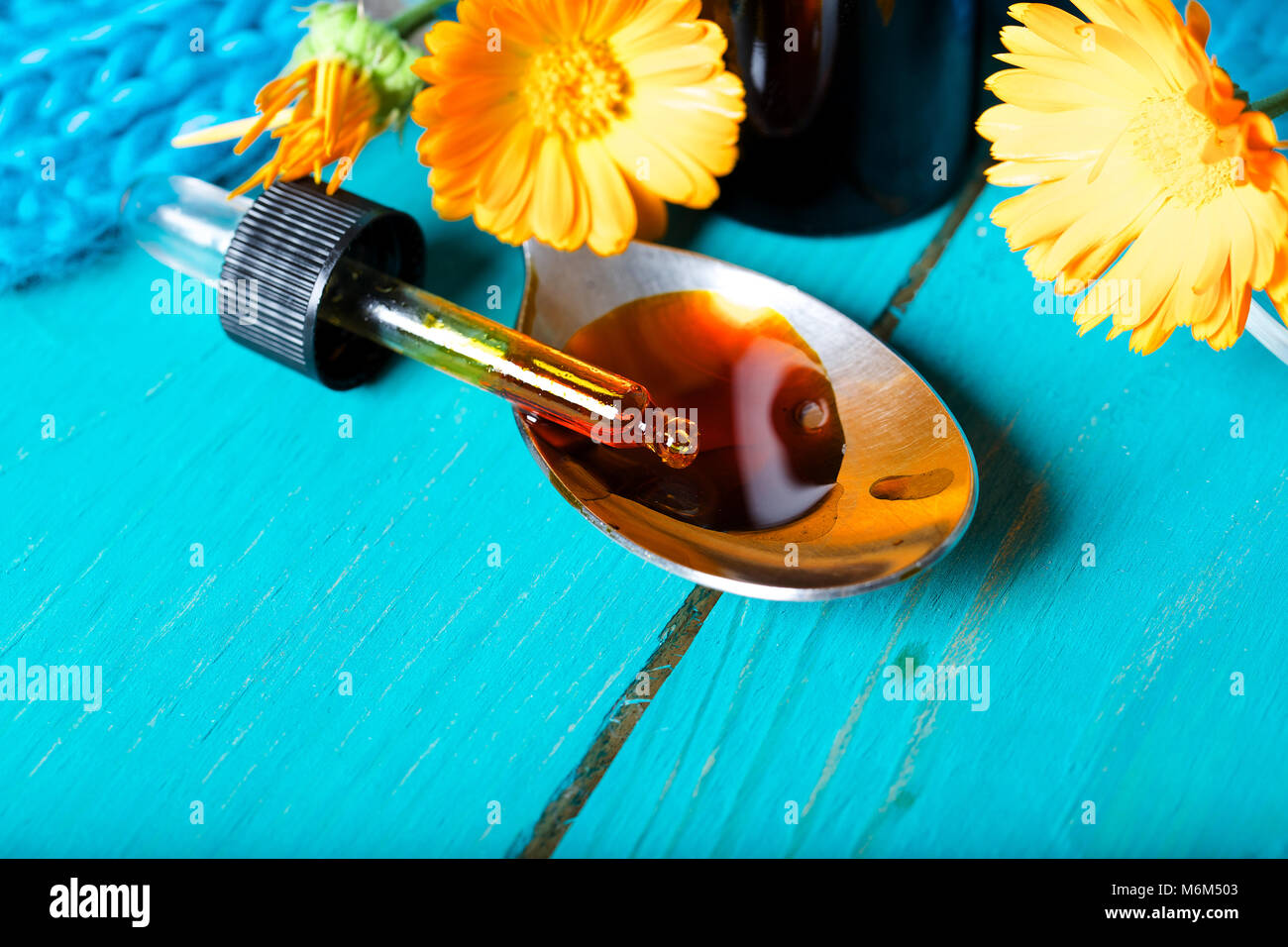 Calendula tincture for mouth rinsing Stock Photo - Alamy