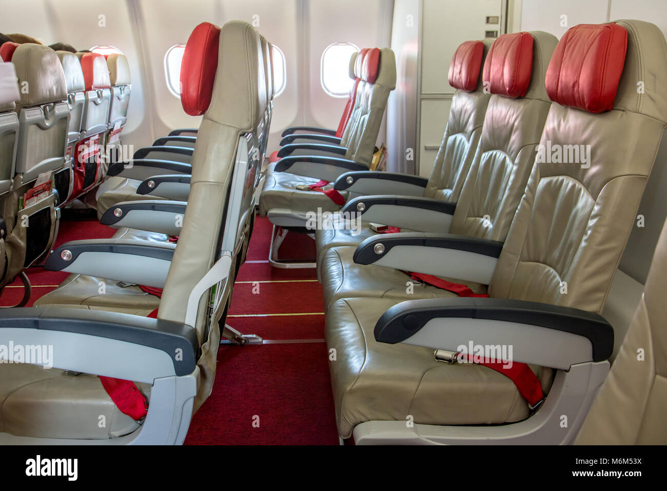 Airplane board with empty seats. Rows of seats in a flying plane ...