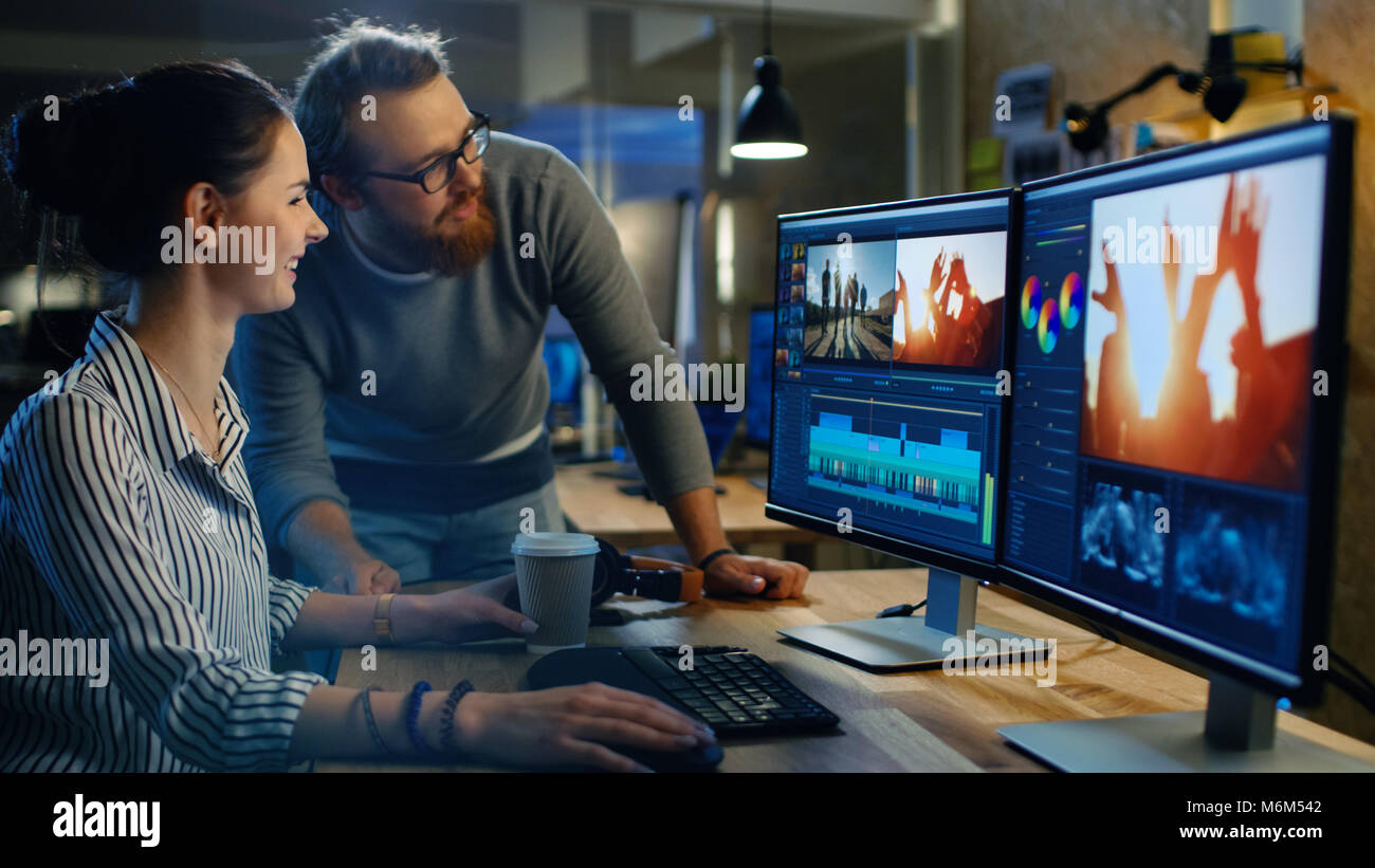 Female Video and Sound Editor Works With Her Male Colleague on Project ...