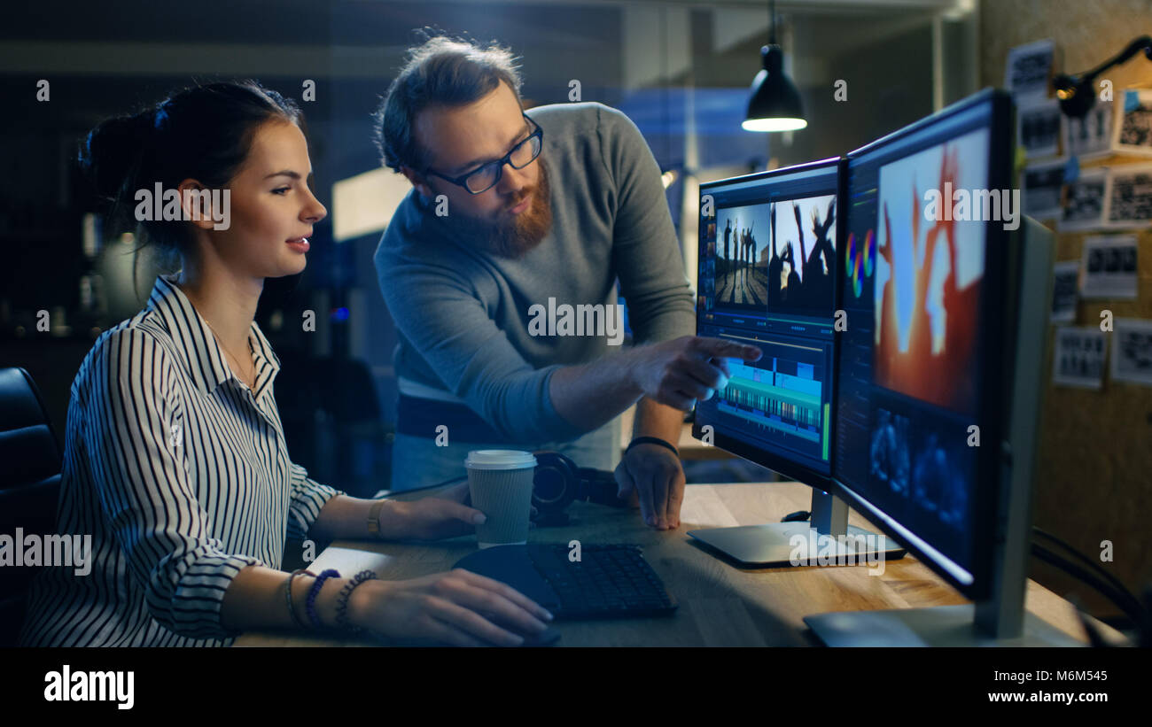 Female Video and Sound Editor Works With Her Male Colleague on Project ...