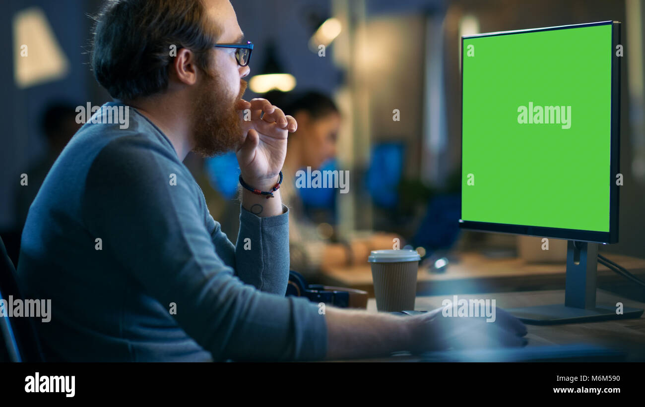 Creative Bearded Man Works on a Personal Computer with Isolated Mock-up ...