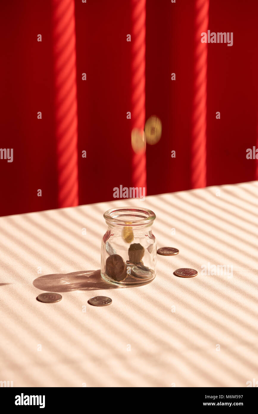 Coins in glass bottle color hi-res stock photography and images - Alamy