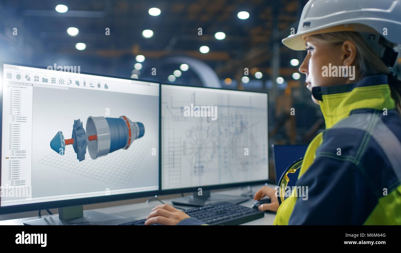 Inside the Heavy Industry Factory Female Industrial Engineer Works on ...