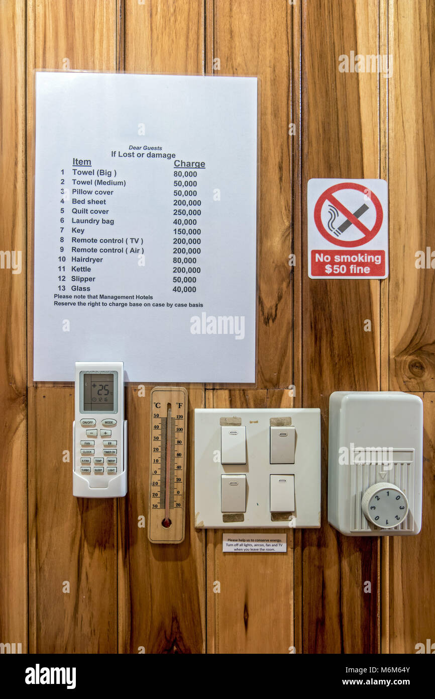 Climate control in the hotel room on the wall. List of items in a hotel ...