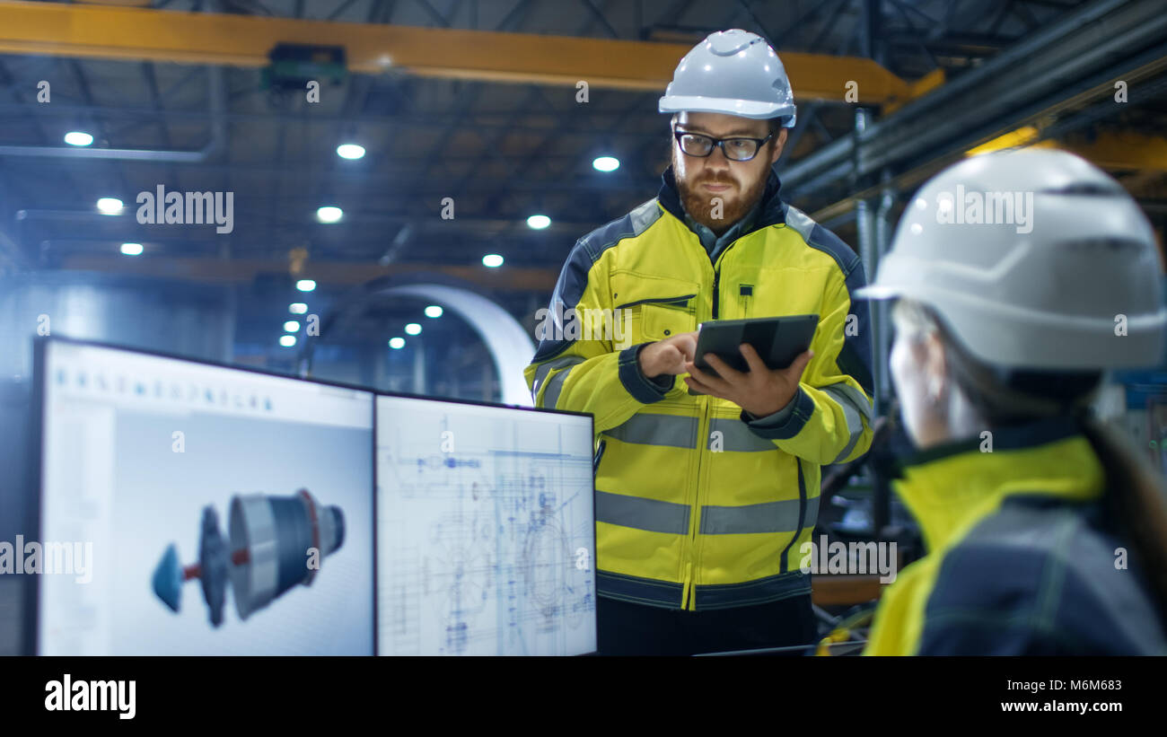 Inside the Heavy Industry Factory Female Industrial Engineer Works on ...