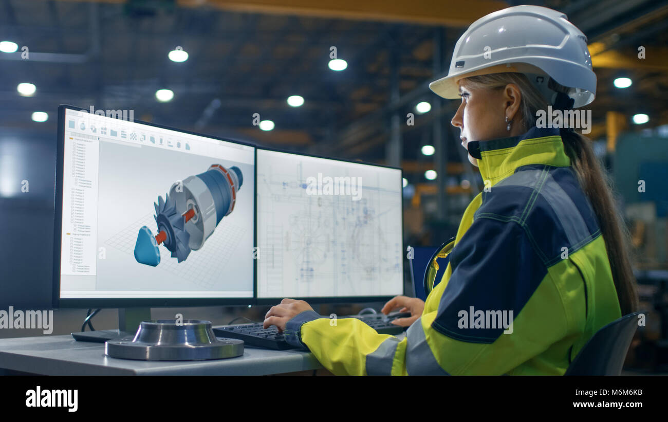 Inside the Heavy Industry Factory Female Industrial Engineer Works on ...