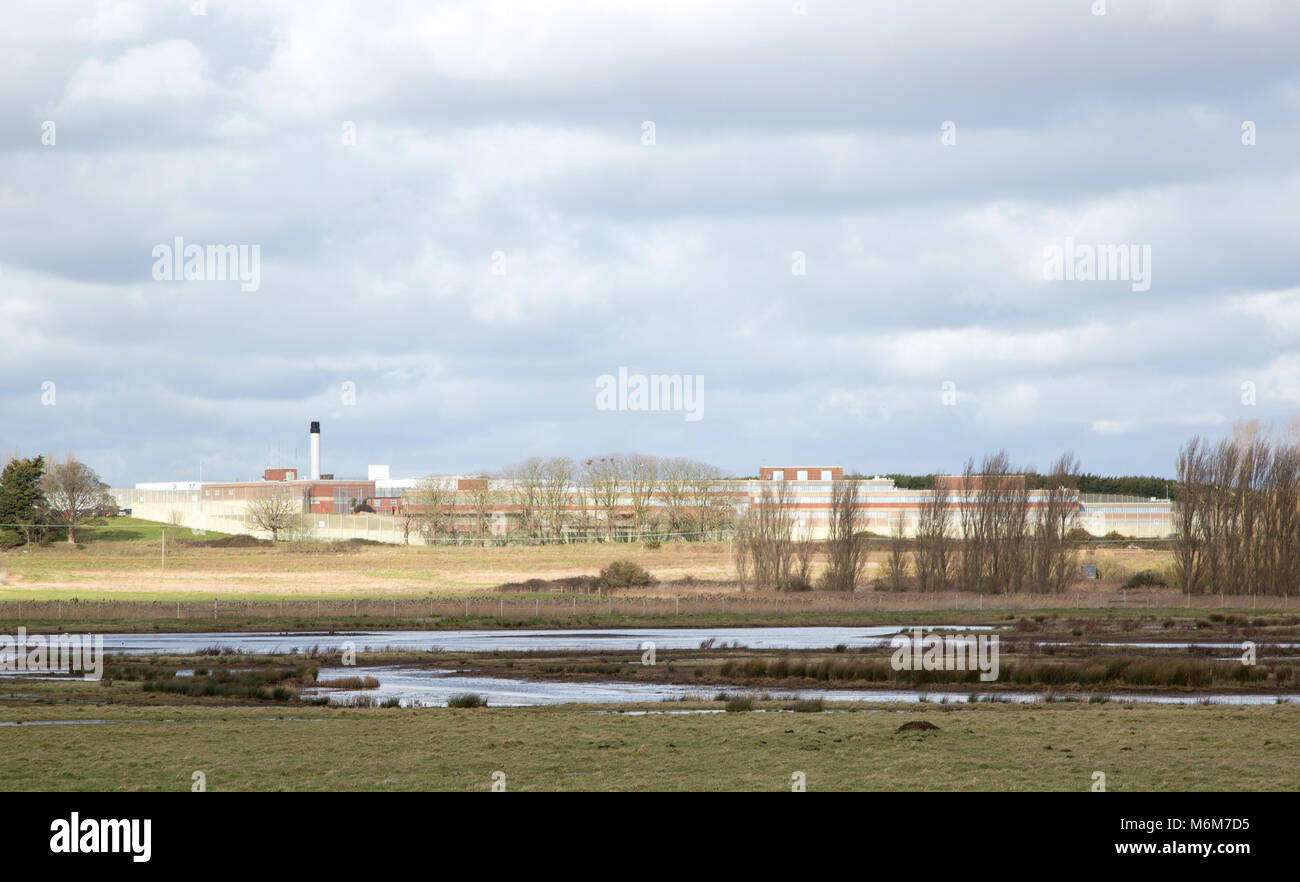 Wetland marshes landscape next to HMP Warren Hill prison, Hollesley Bay ...