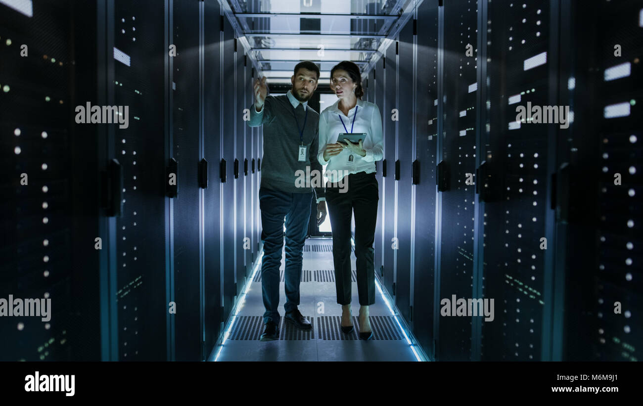 IT Engineer Shows Working Data Center / Server Room to Female Chief ...