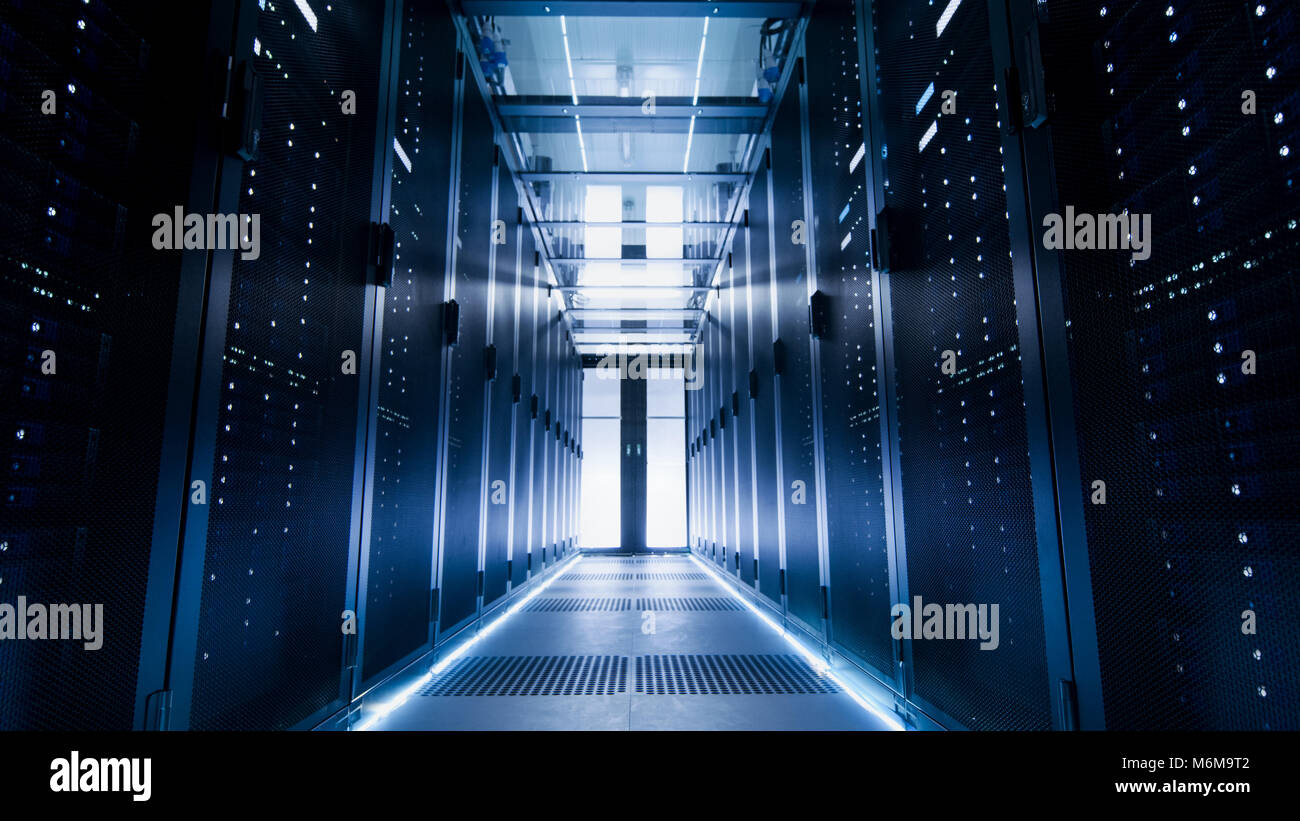 Shot of a Corridor in Large Working Data Center Full of Rack Servers ...