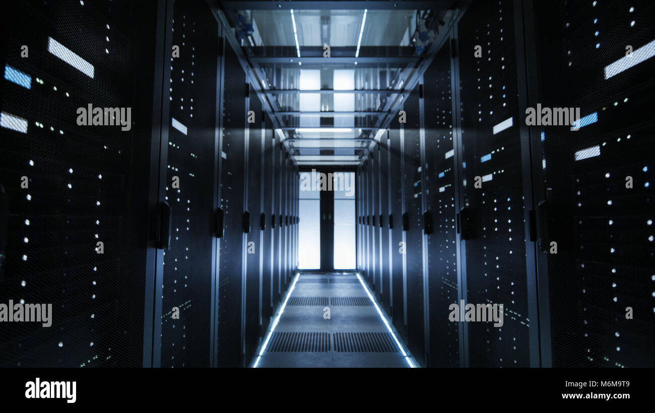 Shot of a Corridor in Large Working Data Center Full of Rack Servers ...