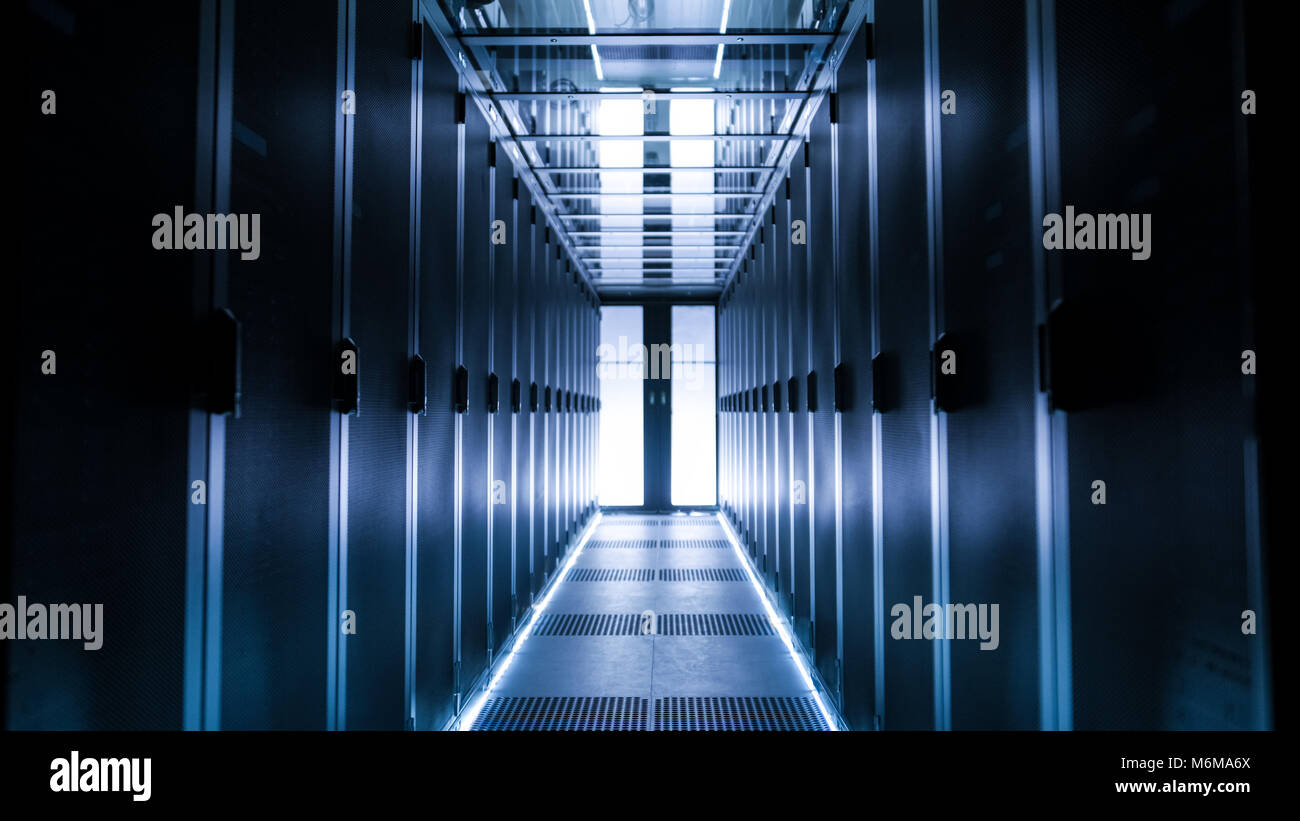 Shot of Corridor in Large Working Data Center Full of Rack Servers and ...