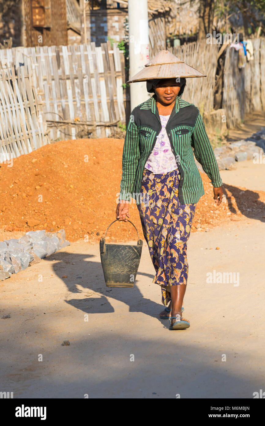 Villagers undertake manual road construction work at West Phwar Saw ...