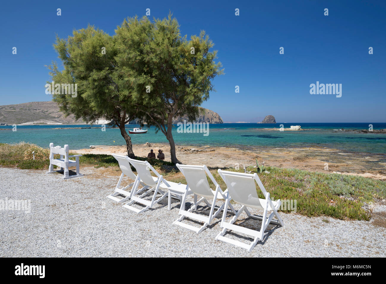Deckchairs looking over the sea at Nefeli Sunset Studios, Pollonia ...