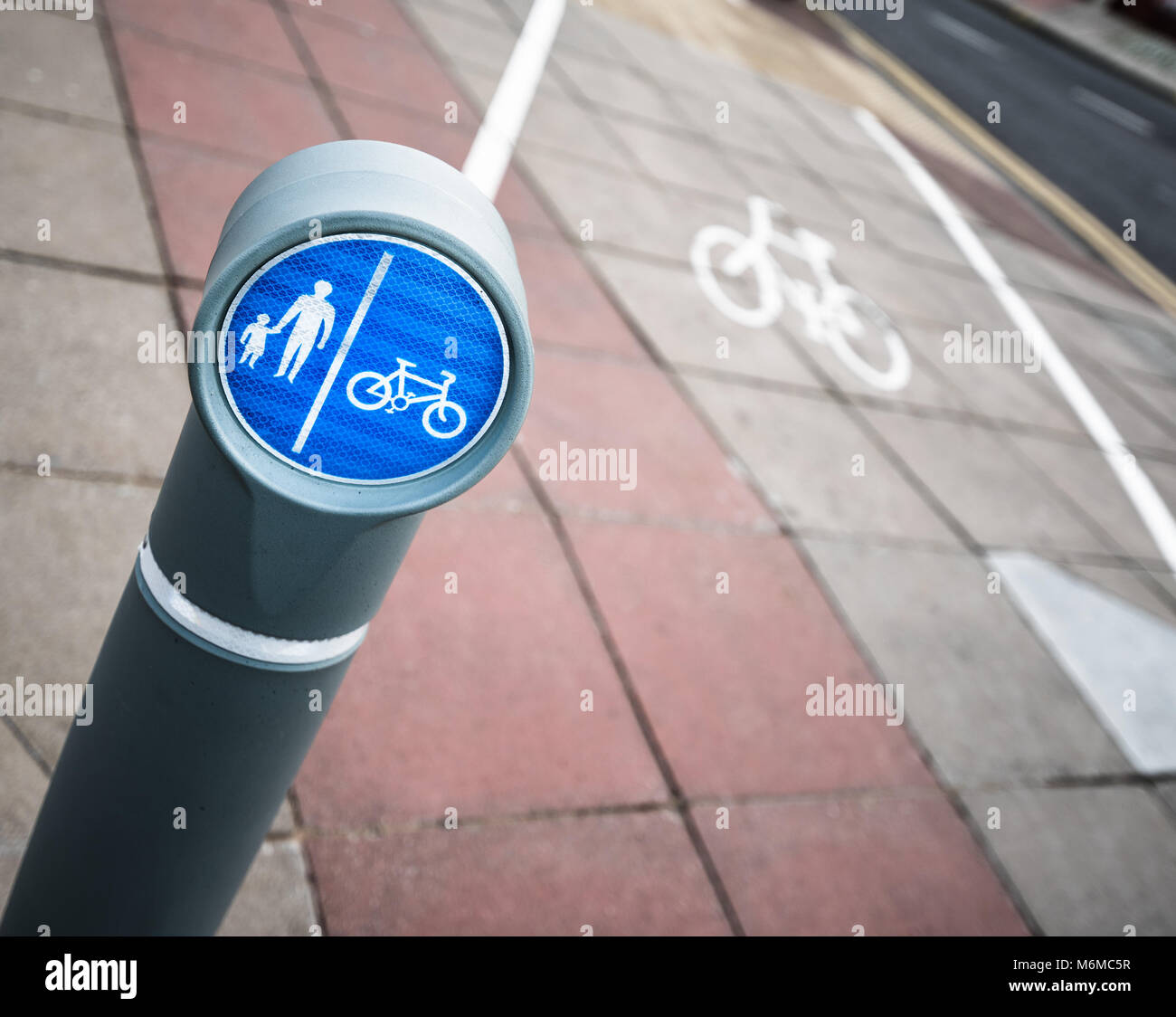 Modern Cycle and pedestrian path bollard Stock Photo - Alamy