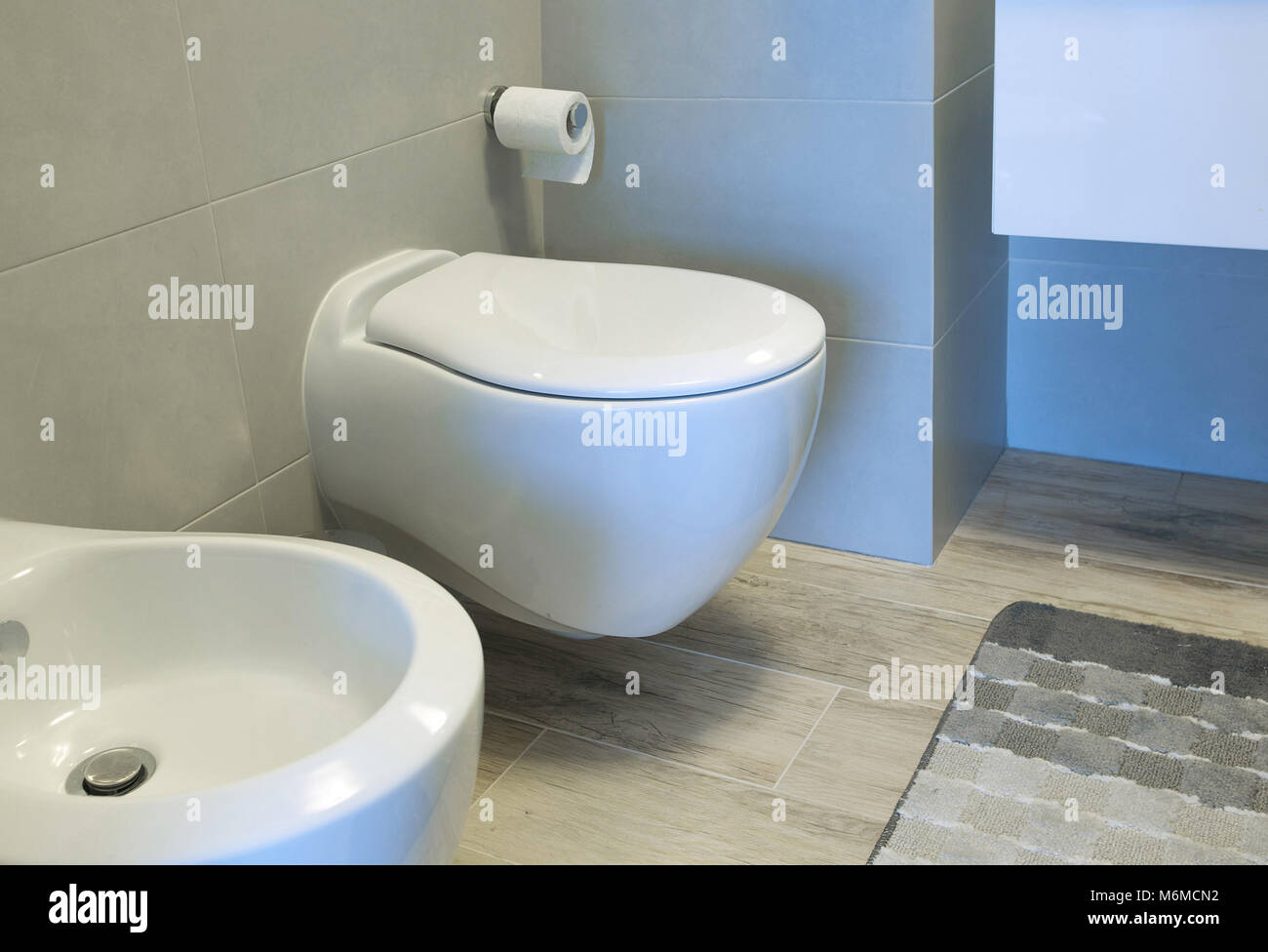 Closed flush toilet in the bathroom Stock Photo - Alamy