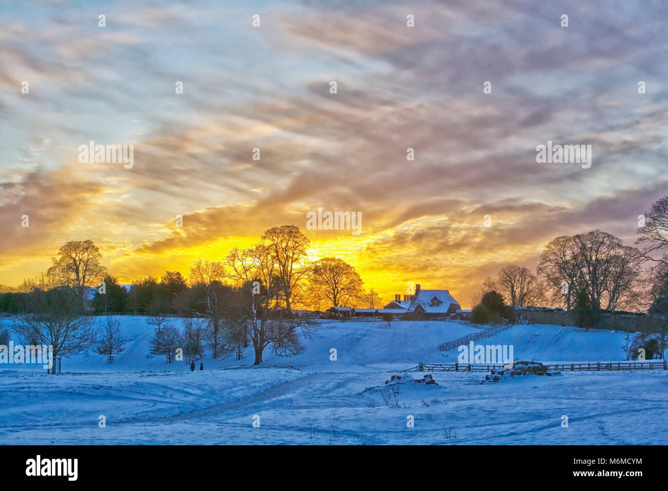 Sunset over the Bolton Abbey estate with snow on the ground Stock Photo ...