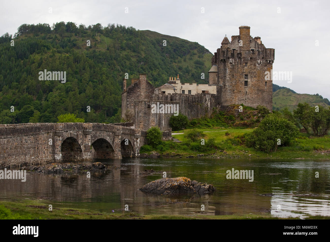 Scottish castle and arched road bridge Stock Photo - Alamy