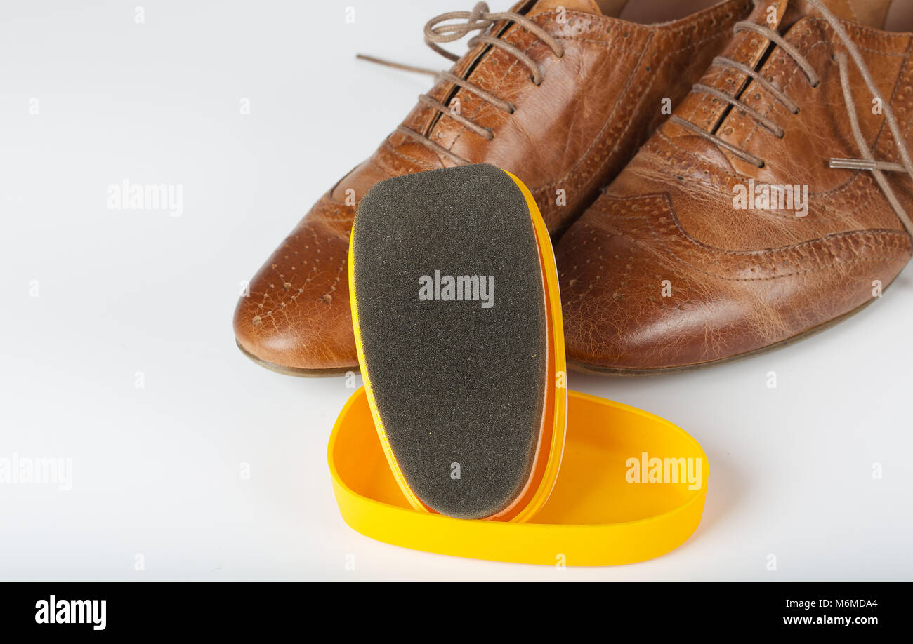 Shoe shine sponge on a gray background Stock Photo - Alamy