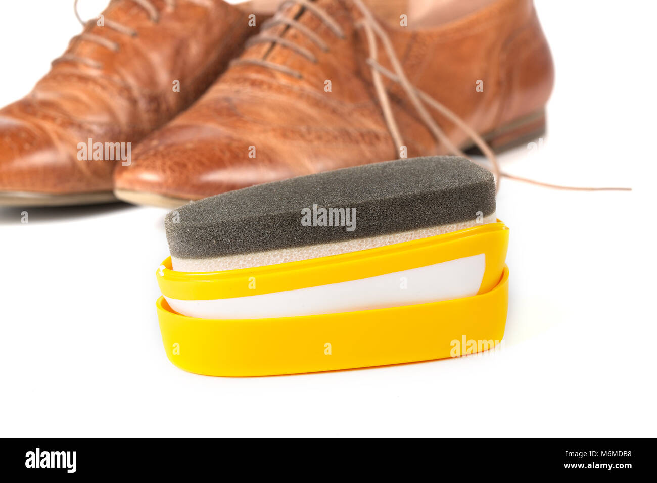 Shoe shine sponge on a gray background Stock Photo - Alamy