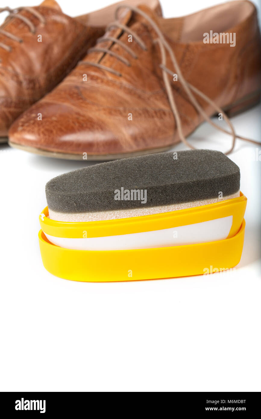 Shoe shine sponge on a gray background Stock Photo - Alamy