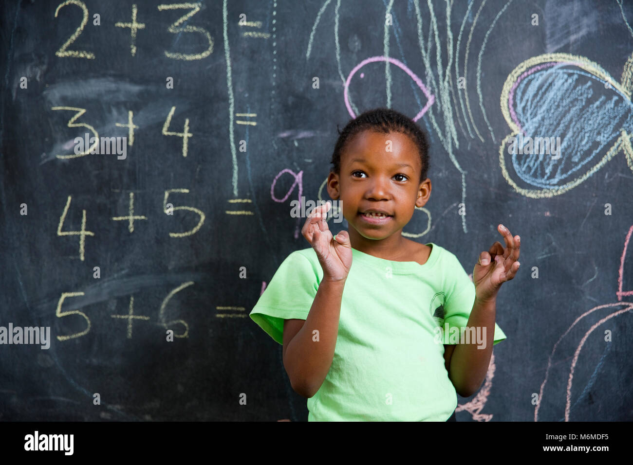 School girl child counting on her hands Stock Photo - Alamy