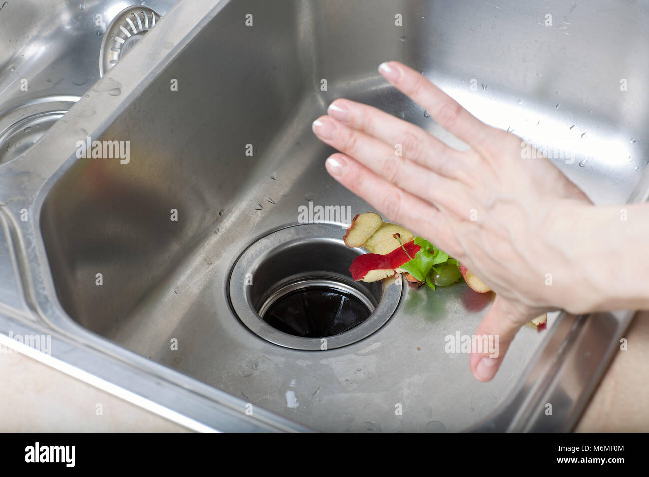 Garbage disposal sink hi-res stock photography and images - Alamy