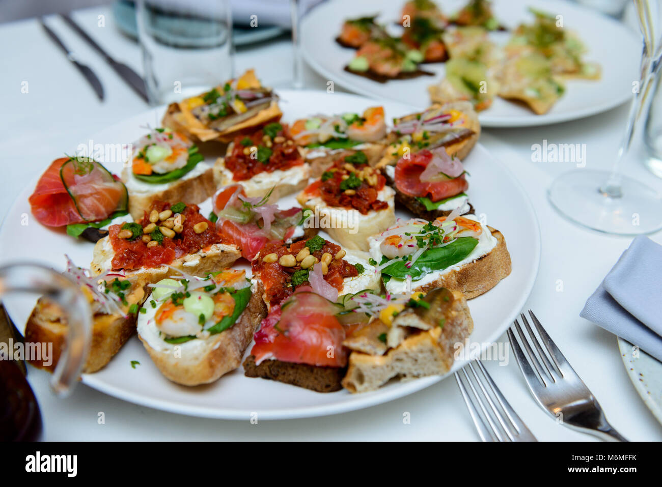 Nice restaurant food. Serving the table with a variety of food Stock ...