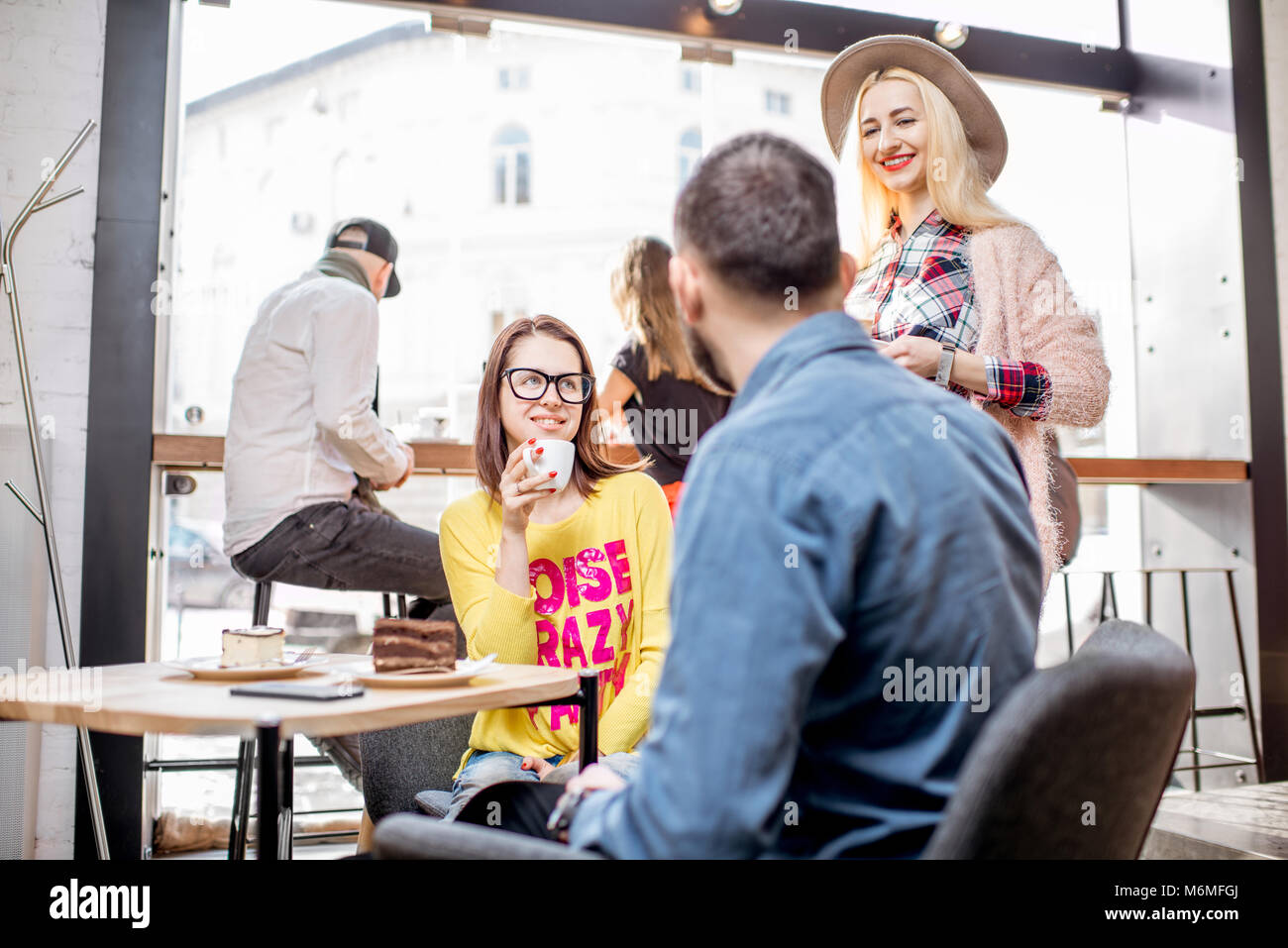 Diverse group of friends cafe hi-res stock photography and images - Alamy