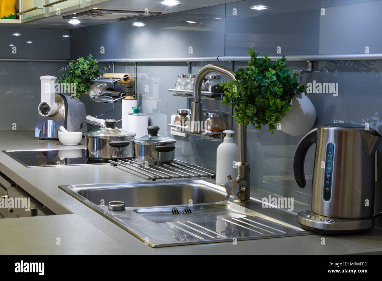 Modern kitchen at home with kitchenware Stock Photo - Alamy
