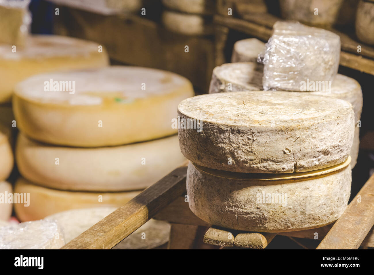 Different kinds of rustic organic hand made cheese Stock Photo - Alamy