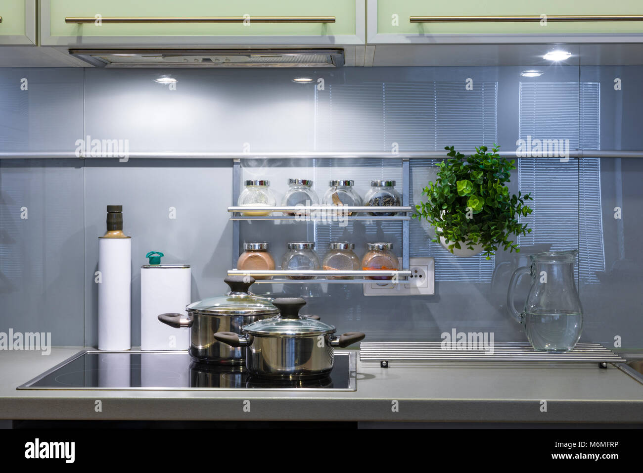 Modern kitchen at home with kitchenware Stock Photo - Alamy