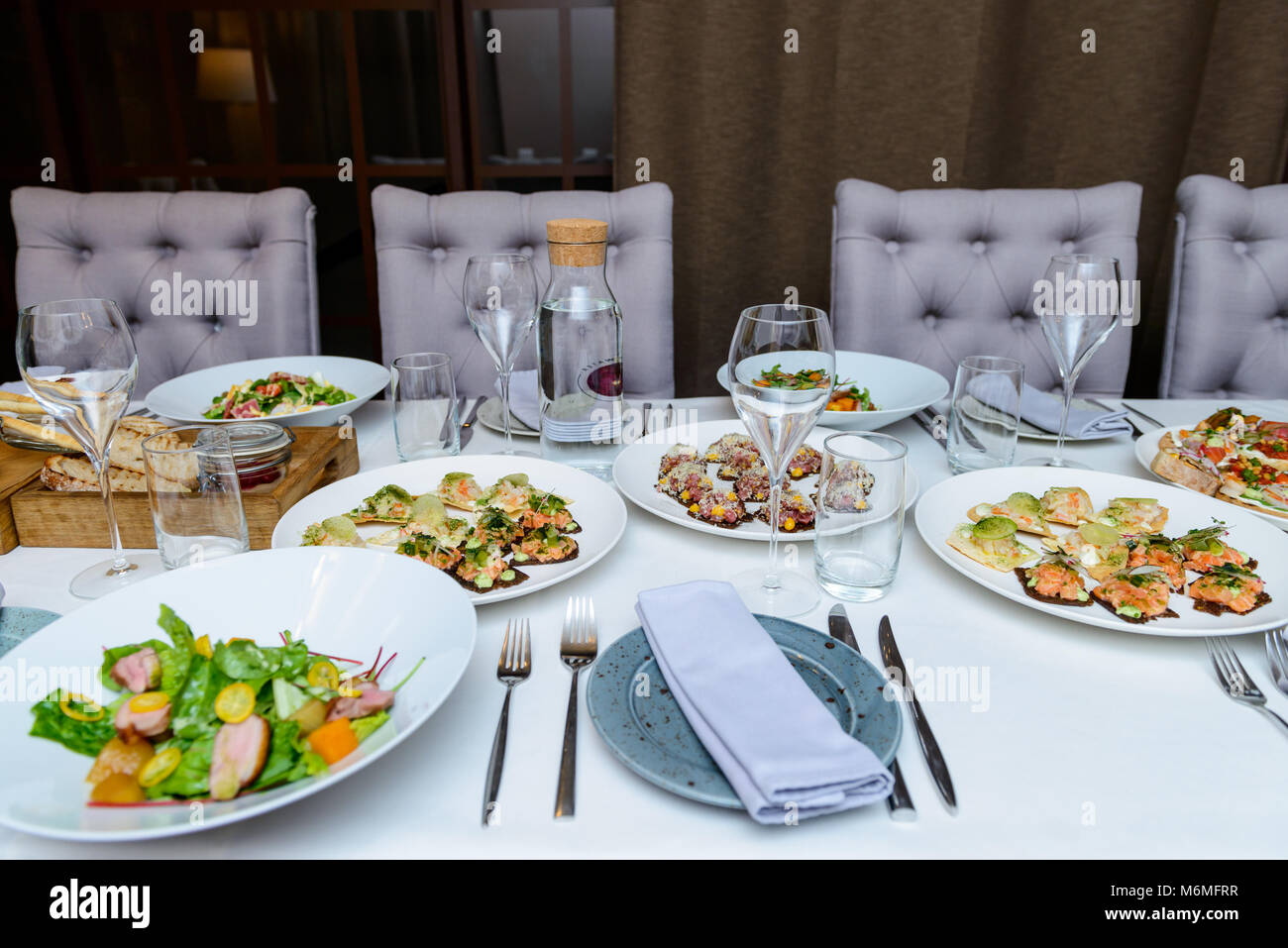 Nice restaurant food. Serving the table with a variety of food Stock ...