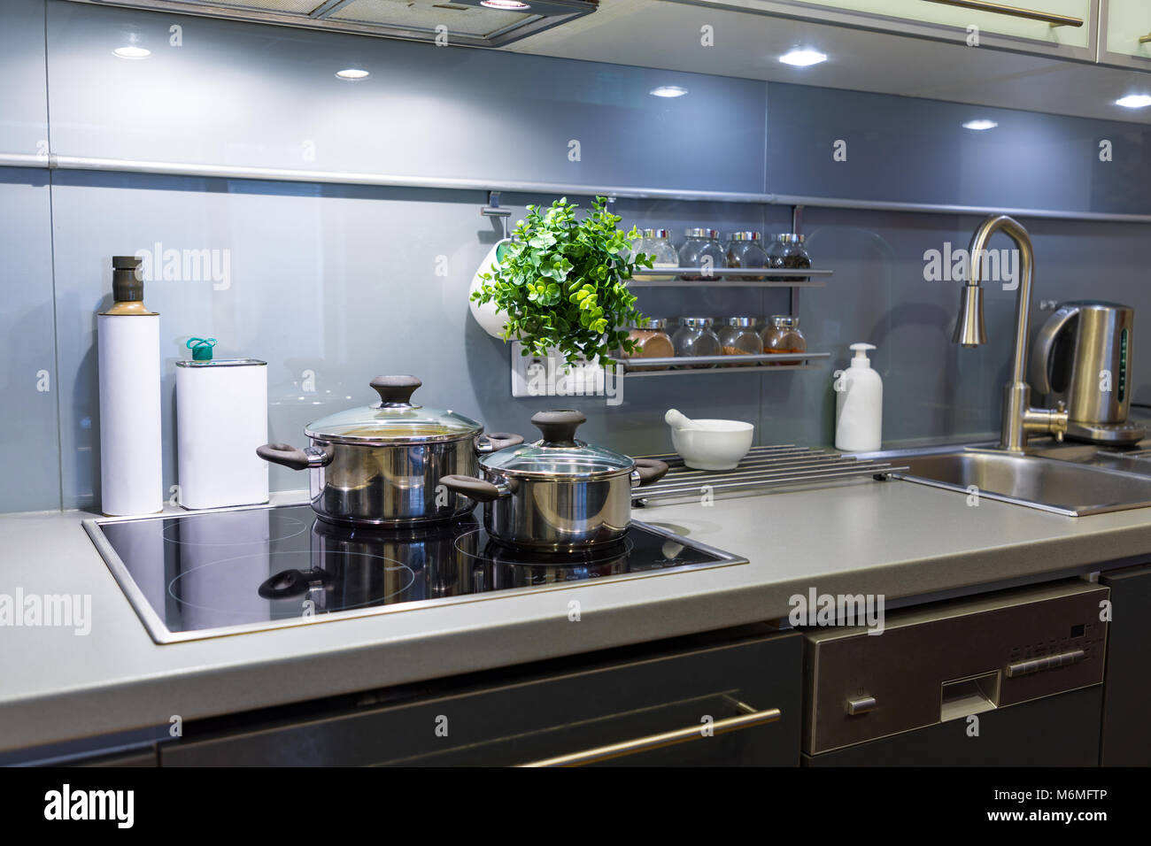 Modern kitchen at home with kitchenware Stock Photo - Alamy