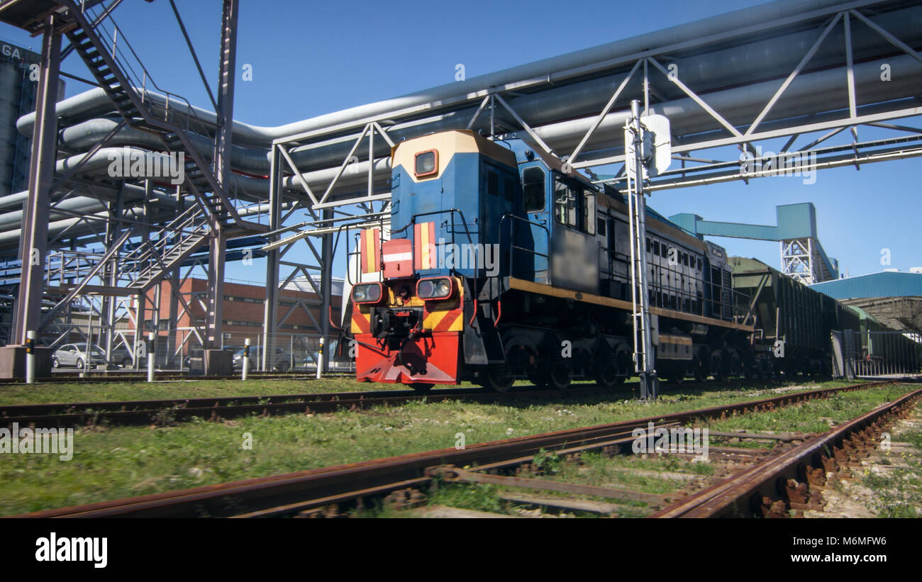 Industrial Diesel Freight Train in Railway Station at loading Stock ...