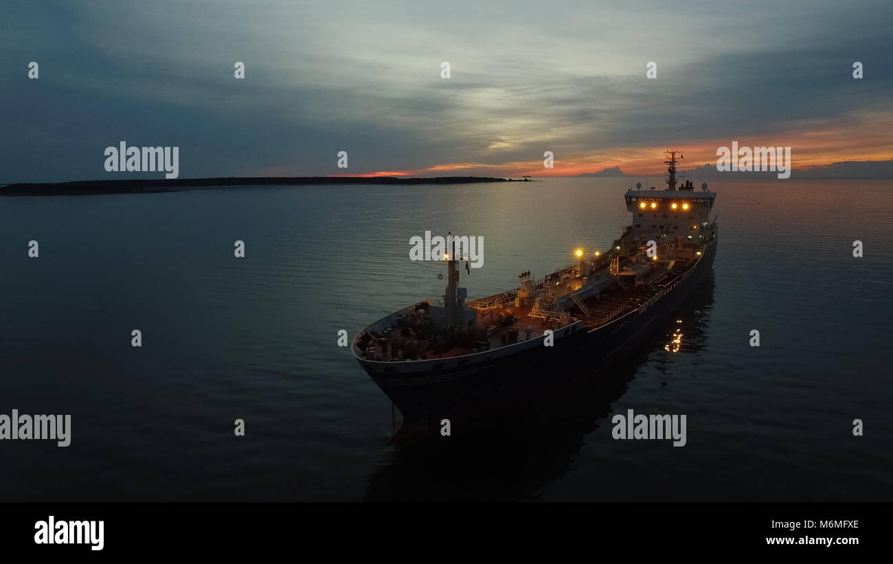 Aerial Shot of Tanker Ship Moving in Sea at Night Stock Photo - Alamy