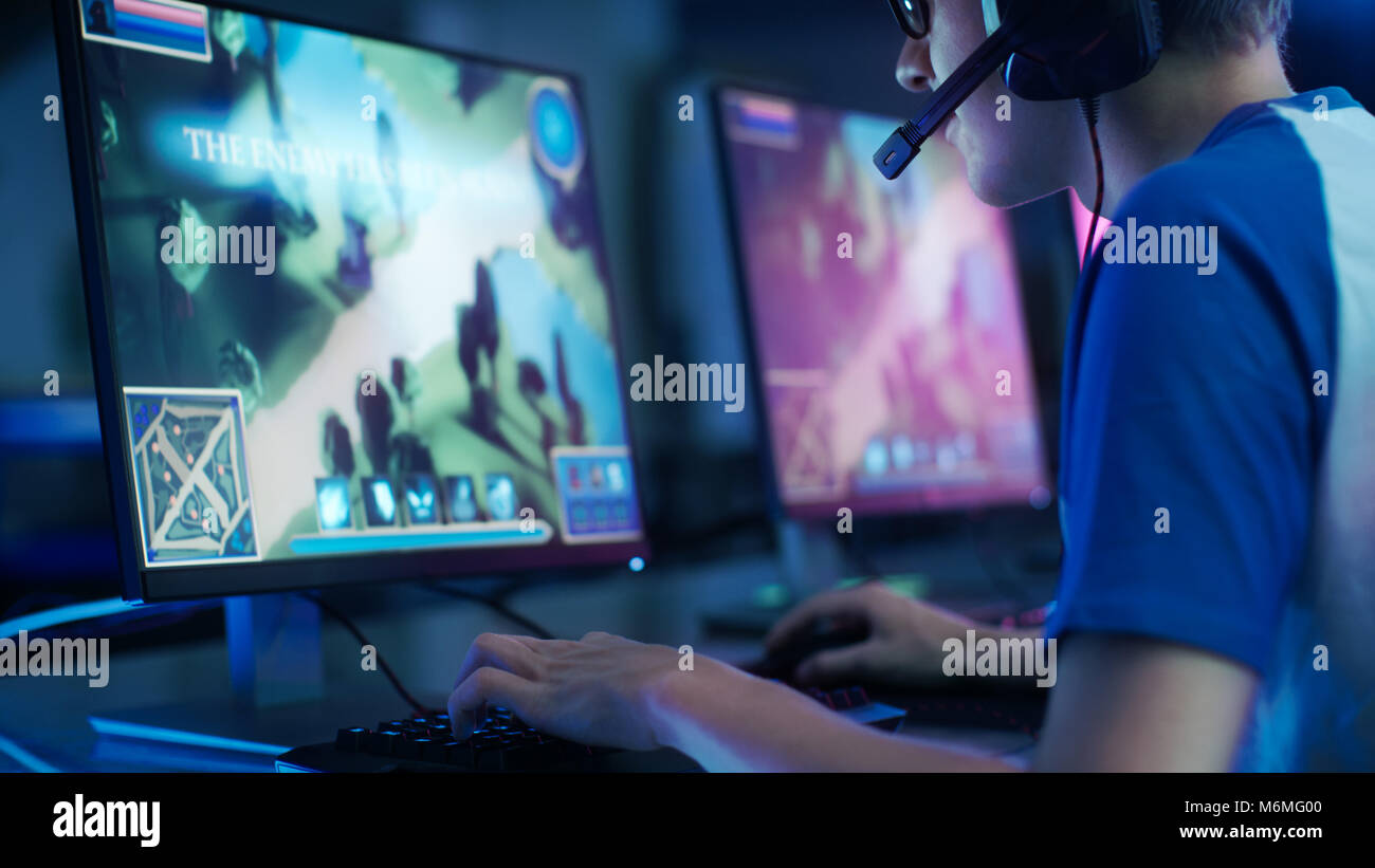 Team of Professional eSport Gamers Playing in Competitive MMORPG ...