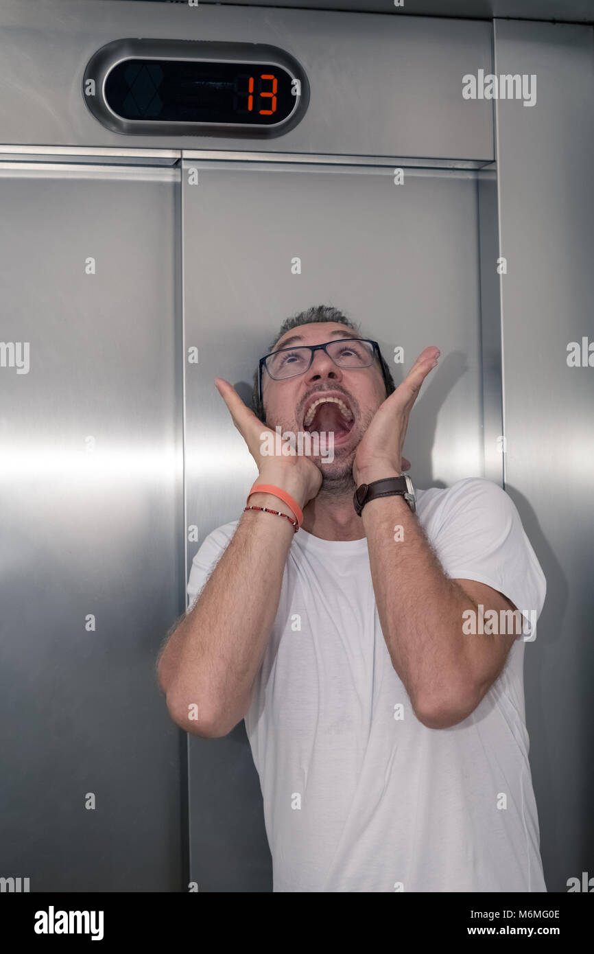 Man screaming in elevator as he is stuck on thirteenth floor in the ...