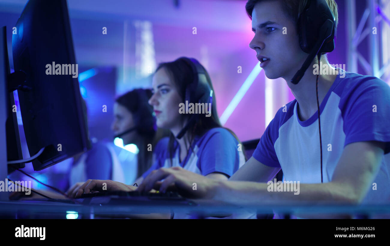 Team of Professional eSport Gamers Playing in Competitive Video Games ...