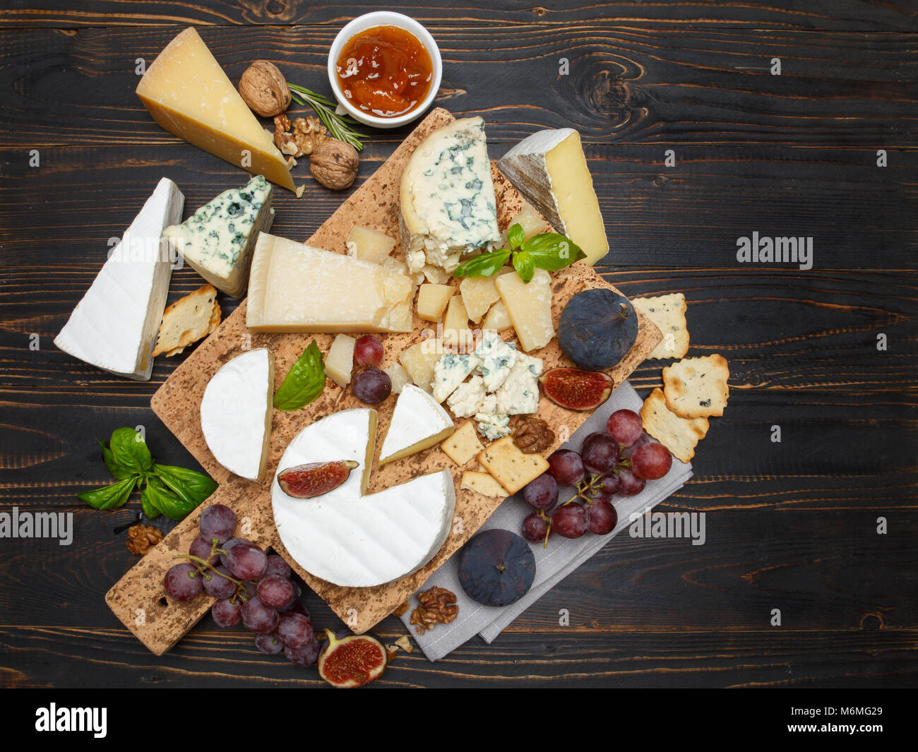 Various types of cheese - parmesan, brie, roquefort, cheddar Stock ...