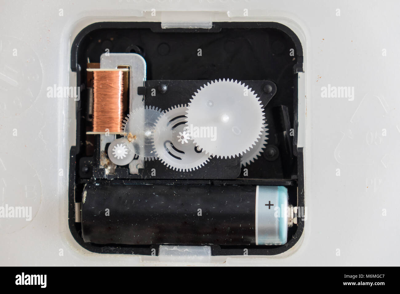 Inside the mechanical clock gears inside the plastic of the watch Stock ...