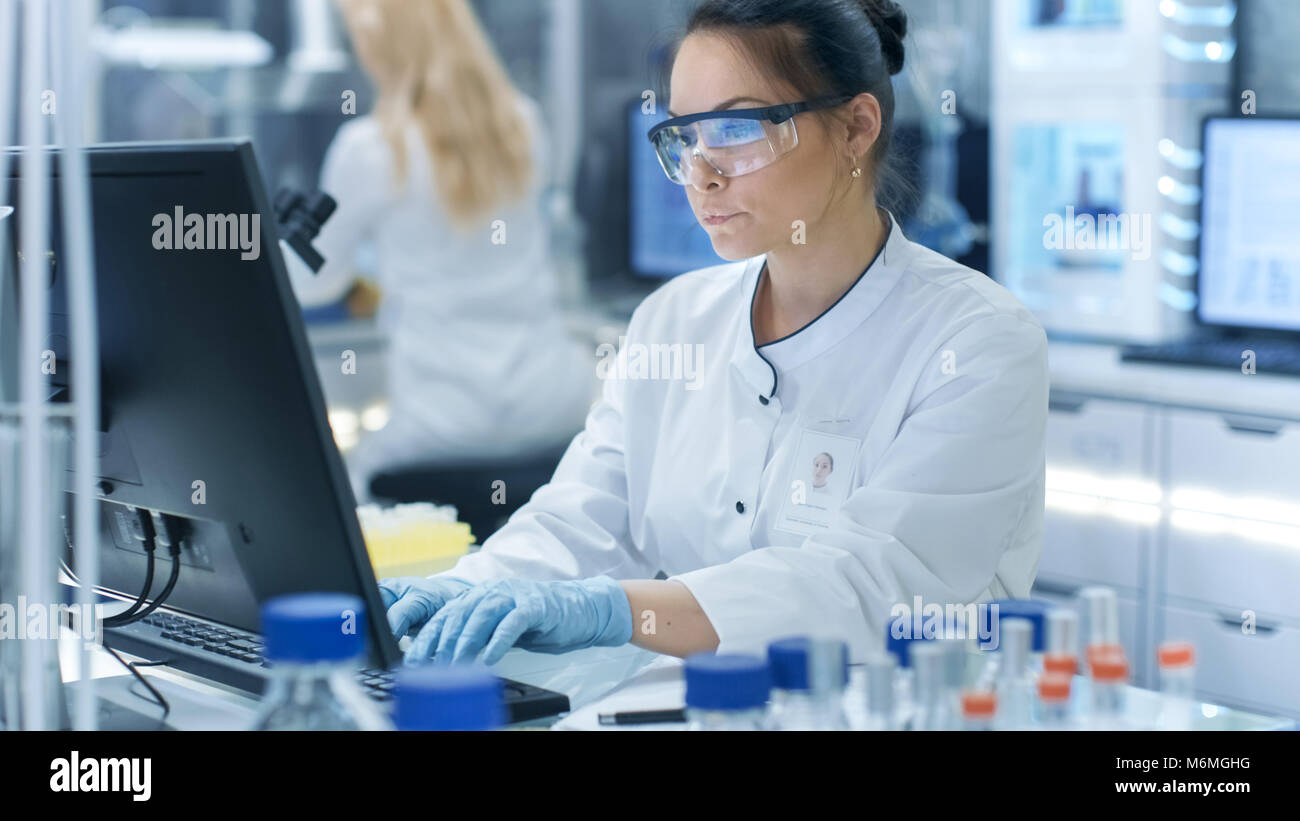 Medical Research Scientist Typing Information Obtained from New ...