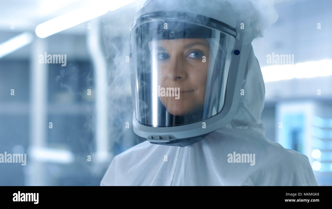 Medical Virology Research Scientist in a Hazmat Suit with Mask, She ...