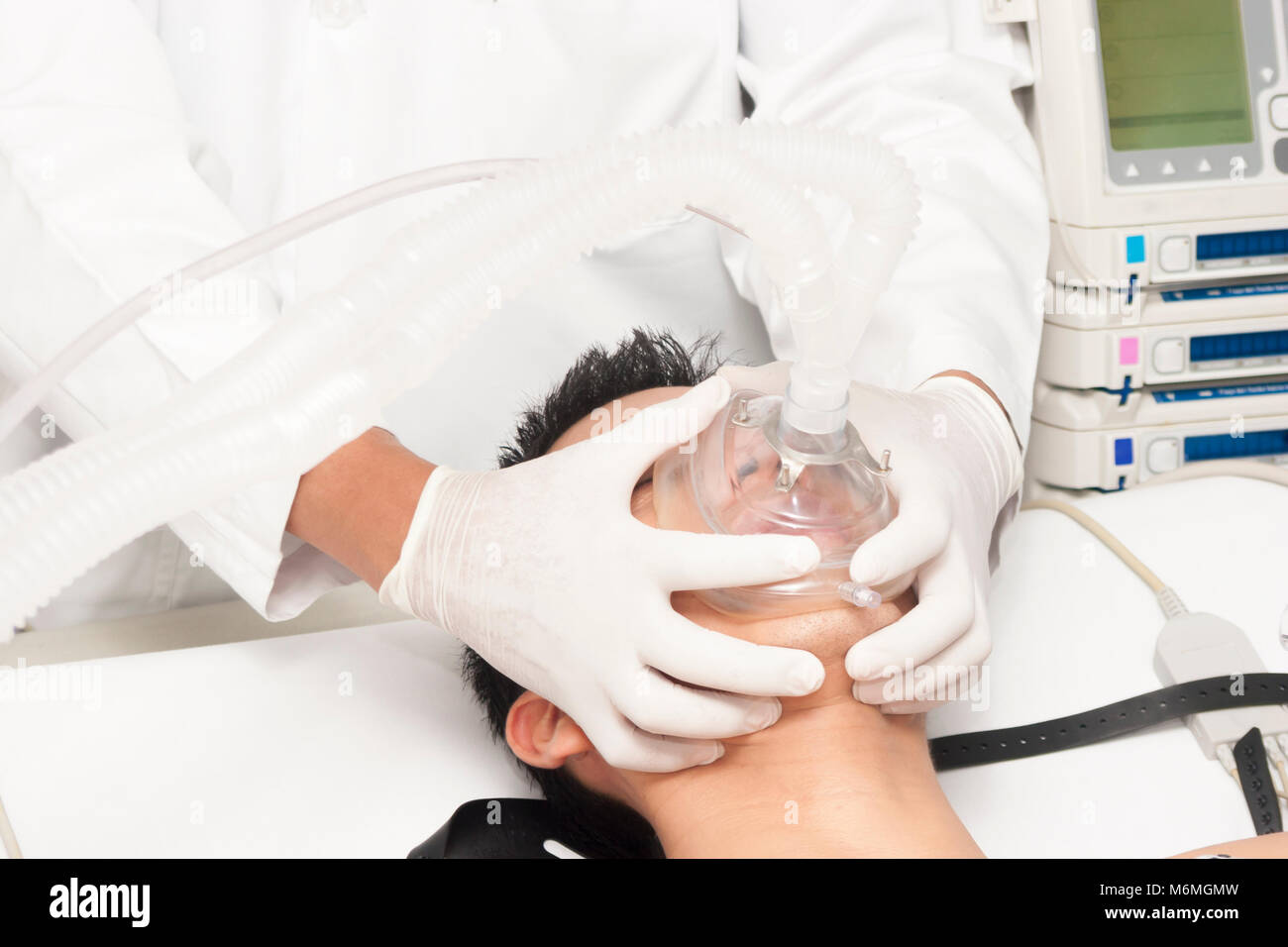 Portrait of patient receives artificial ventilation in hospital Stock ...