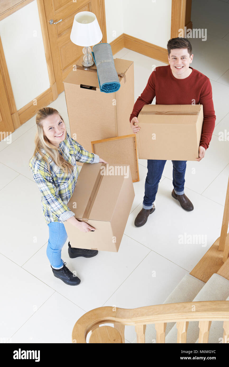Man carrying boxes stairs hi-res stock photography and images - Alamy